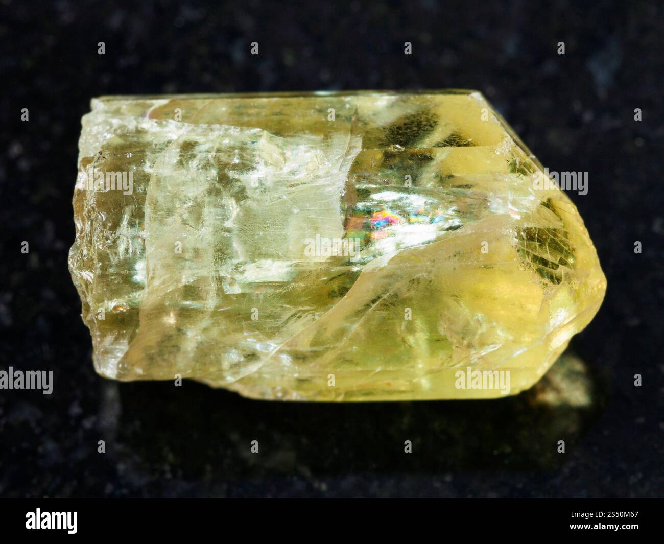 macro shooting of natural mineral rock specimen - crystal of yellow ...
