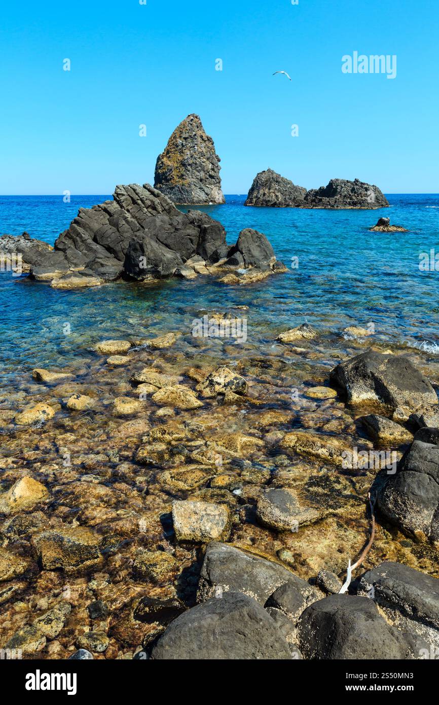 Cyclopean Coast and the Islands of the Cyclops on Aci Trezza town ...