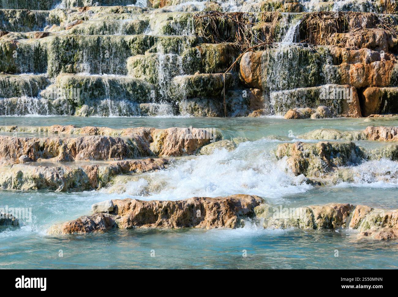 Natural spa with waterfalls and hot springs at Saturnia thermal baths ...