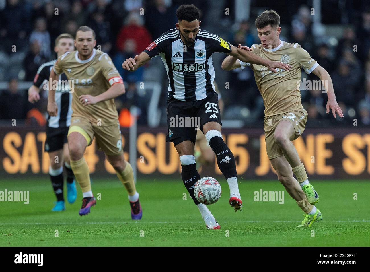 Newcastle United's Lloyd Kelly in action with Bromley's Cameron ...