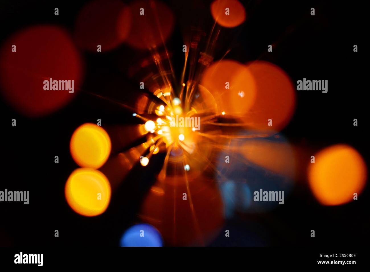 Colorful light explosion on black background. Futuristic wallpaper ...