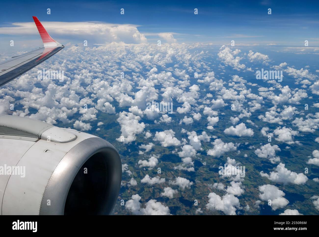 cloudscape sky and airplane wings view from window. cloudscape sky view ...