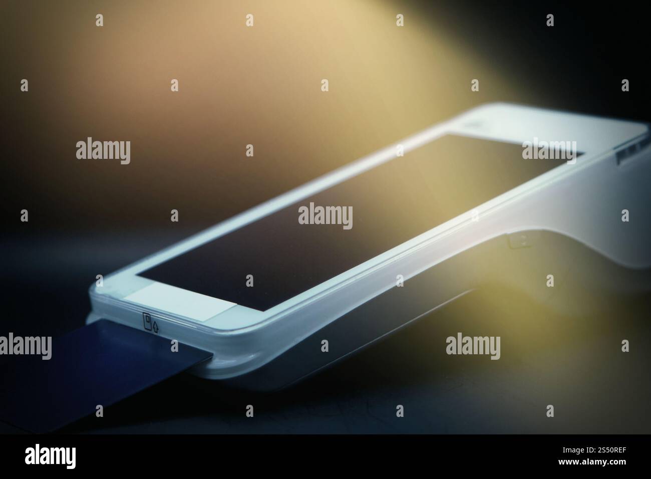 Modern credit card terminal with a credit card inside , isolated with a ...