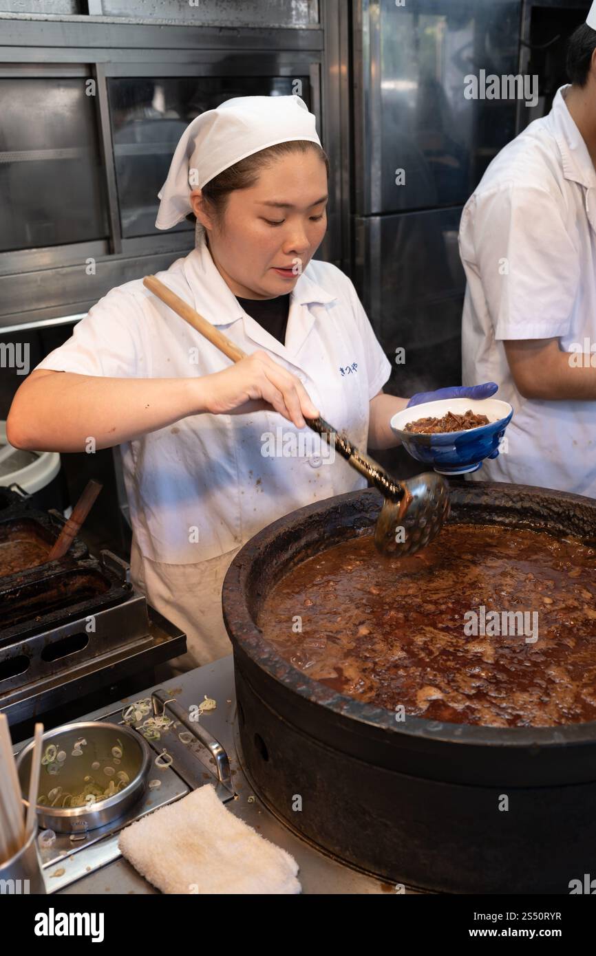 Female Chef Cooking at Gyu-Don Beef Stew Restaurant at Kitsuneya ...
