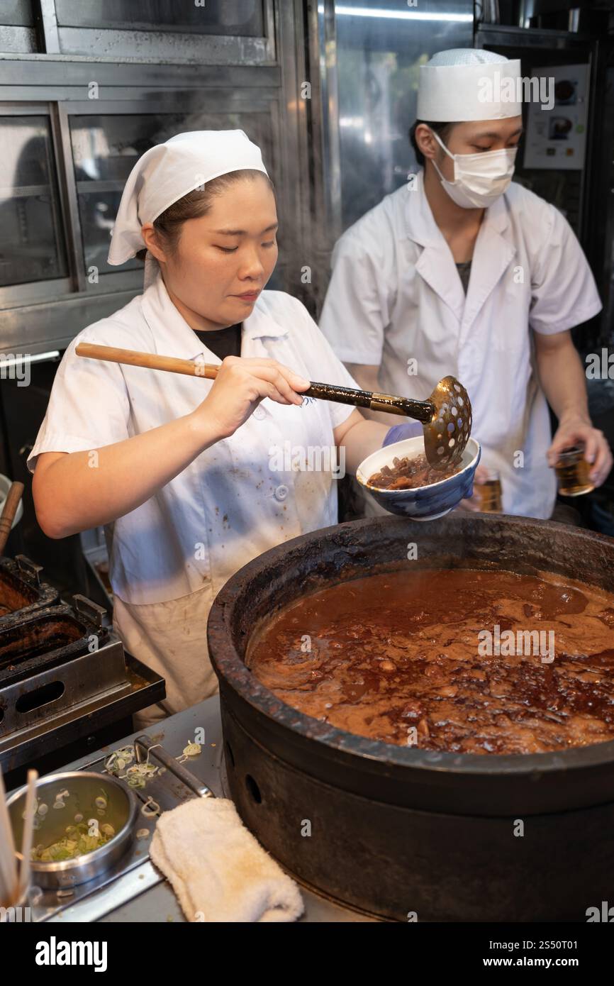 Female Chef Cooking at Gyu-Don Beef Stew Restaurant at Kitsuneya ...