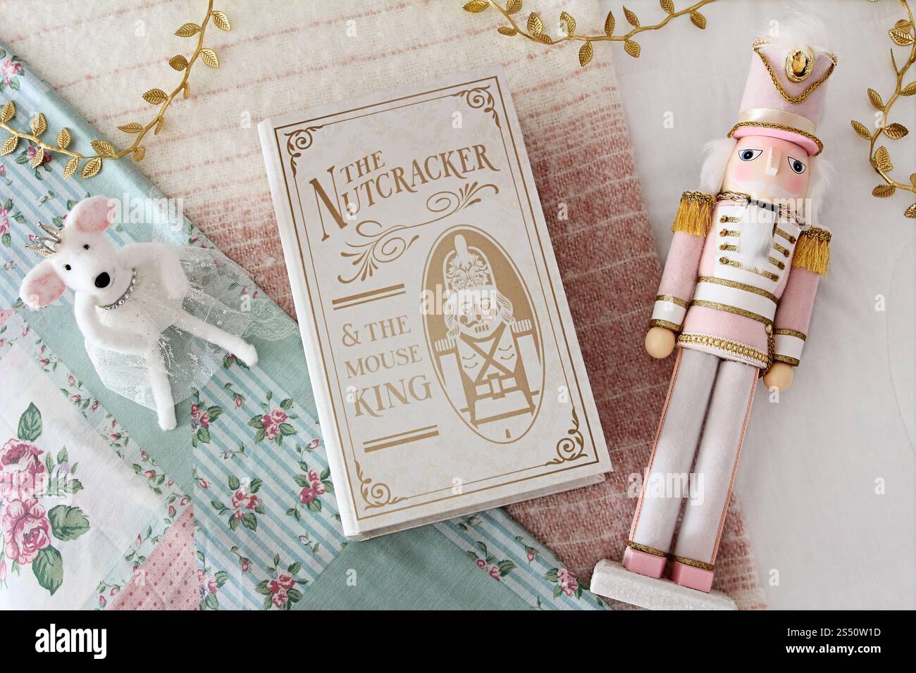 The Nutcracker book with a ballet mouse and pink nutcracker Stock Photo ...