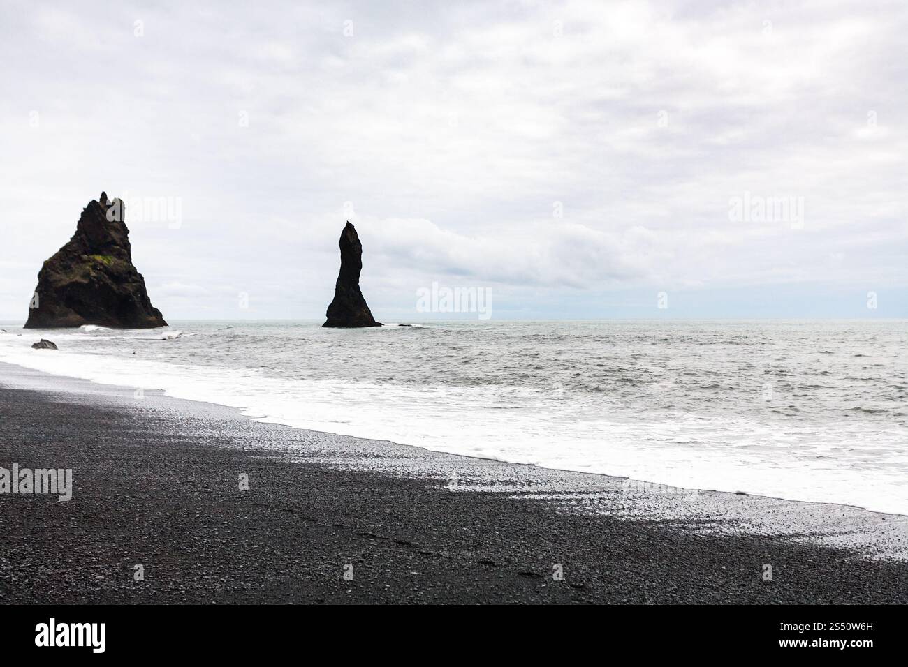 travel to Iceland - view of Reynisdrangar basalt columns on Reynisfjara ...
