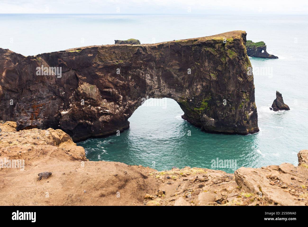 travel to Iceland - lava arch on Dyrholaey peninsula, near Vik I Myrdal ...