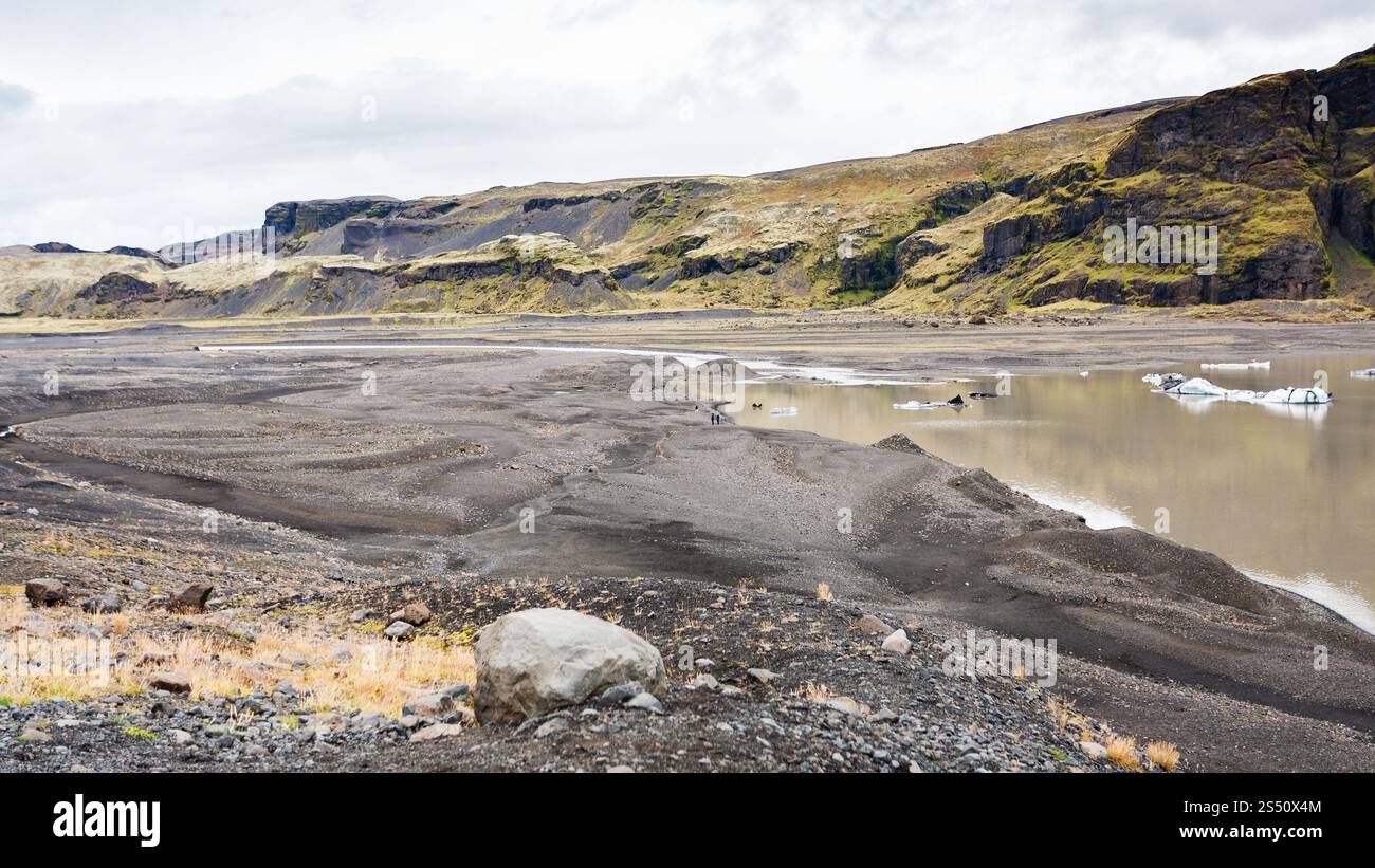 travel to Iceland - hiking path in bed Solheimajokull glacier (South ...