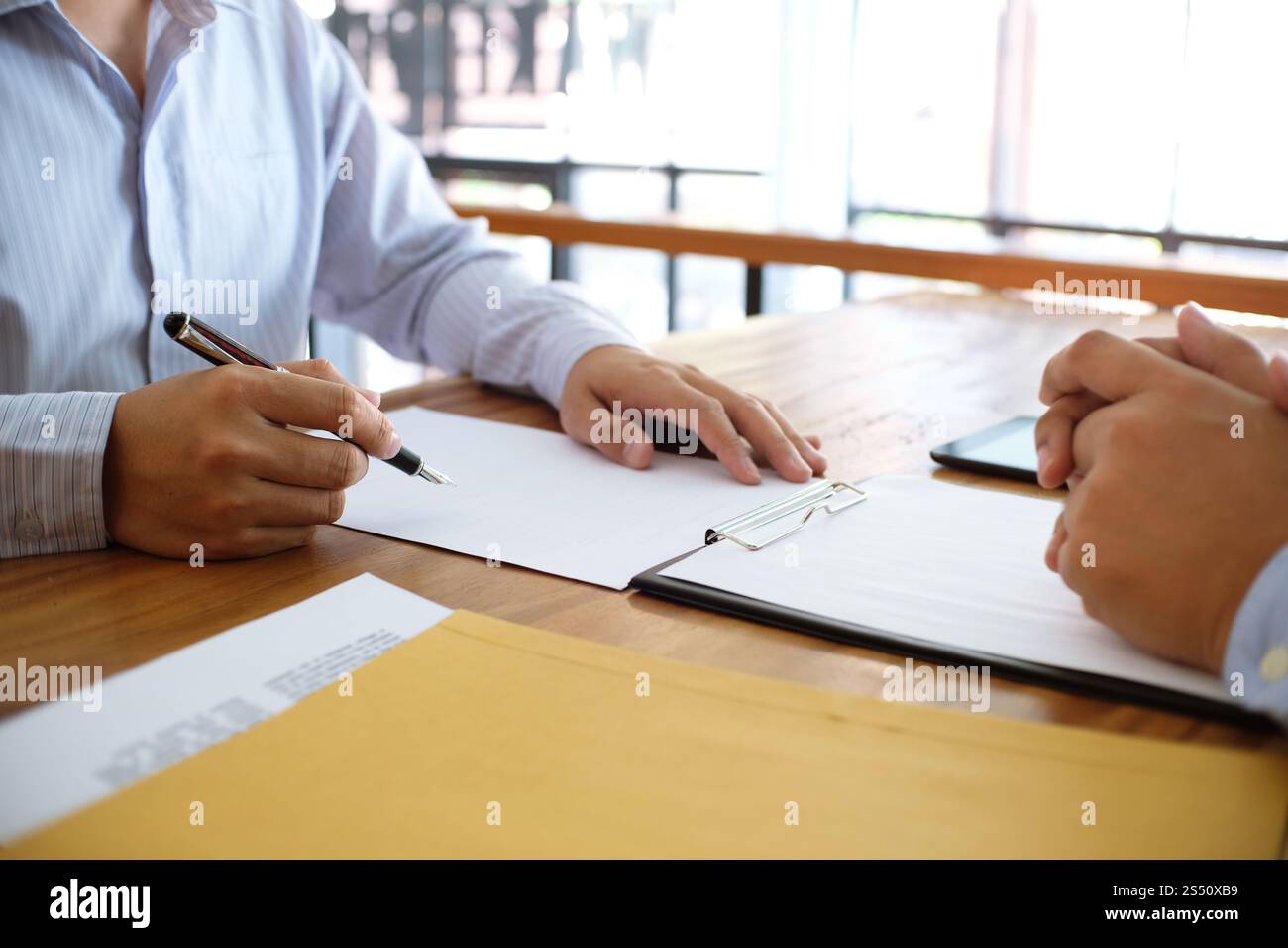 Business man signing contract making a deal with partnership agreement ...