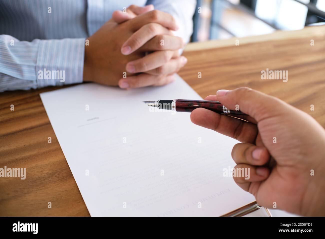 Business man signing contract making a deal with partnership agreement ...