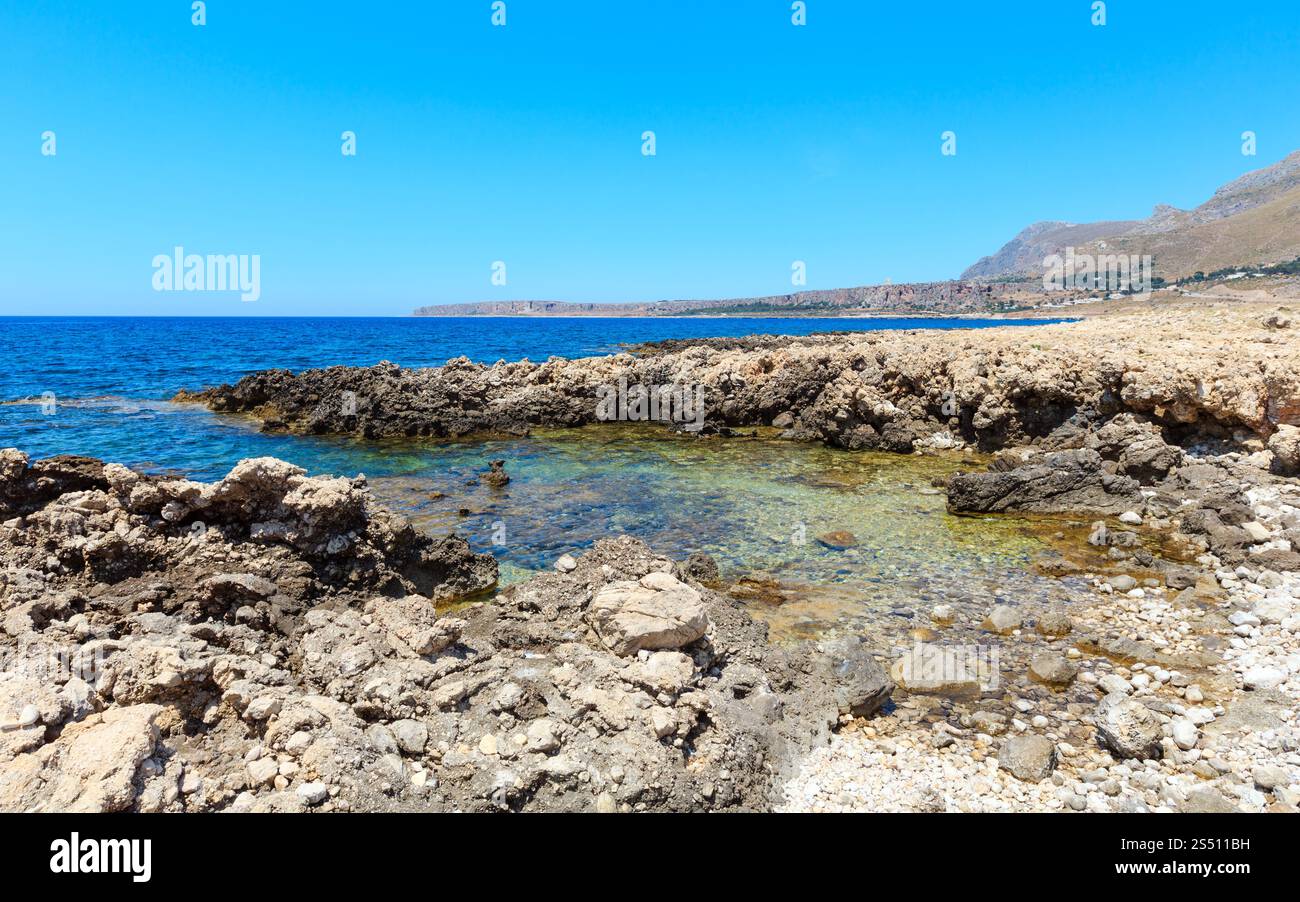 Azure Tyrrhenian sea picturesque bay and Cala di Punta Lunga rocky coast view, Macari, San Vito ...