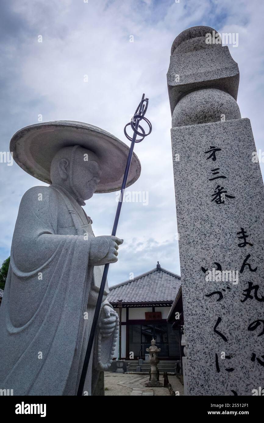 Monk stone statue in Arashiyama temple, Kyoto, Japan. Monk statue in ...