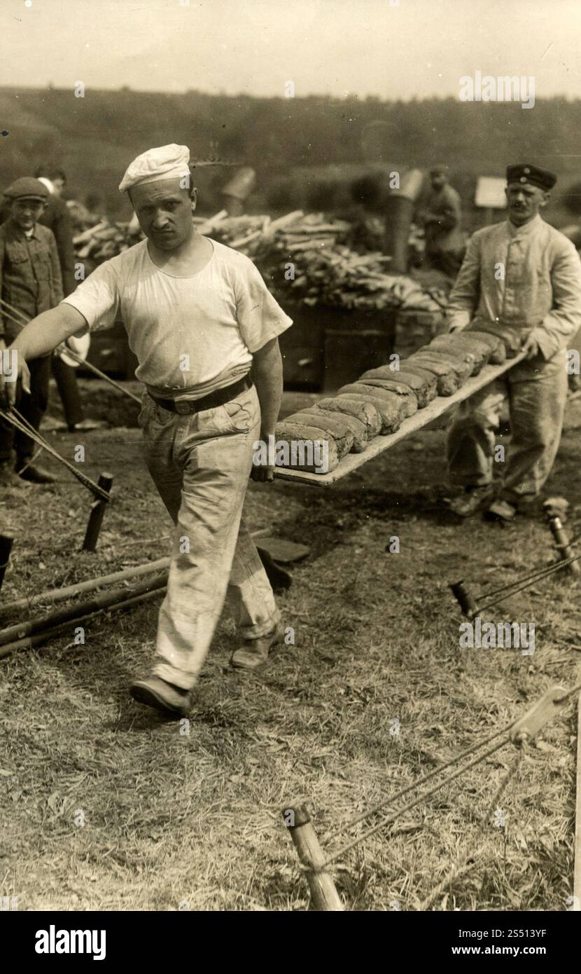 World War I: Supply- German bakers with bread at a field bakery on the ...
