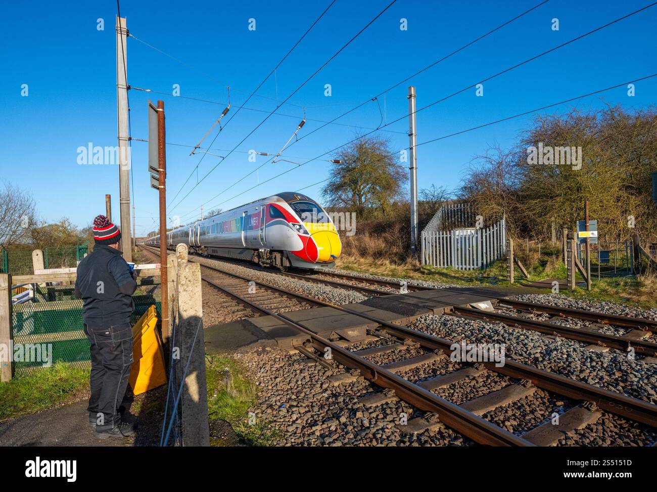 Man looking at the new LNER Azuma electric train operating on the East ...