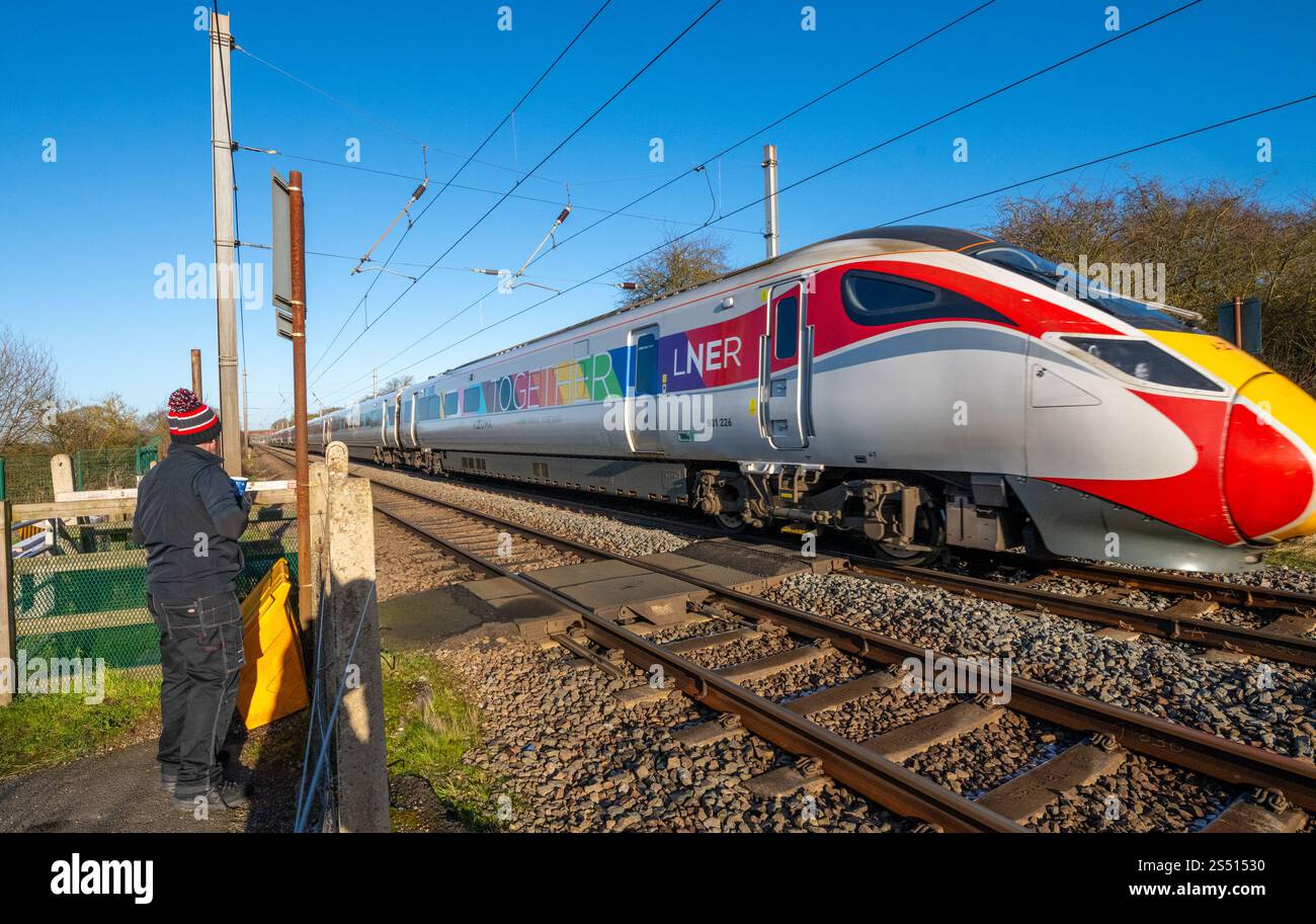 Man looking at the new LNER Azuma electric train operating on the East ...