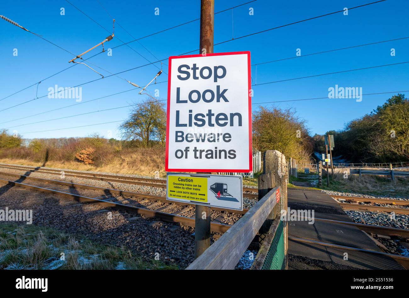 Caution, Look both ways and Stop Look Listern warning signs at level ...