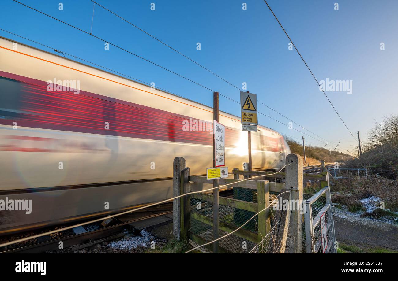 Caution, Look both ways and Stop Look Listern warning signs at level ...