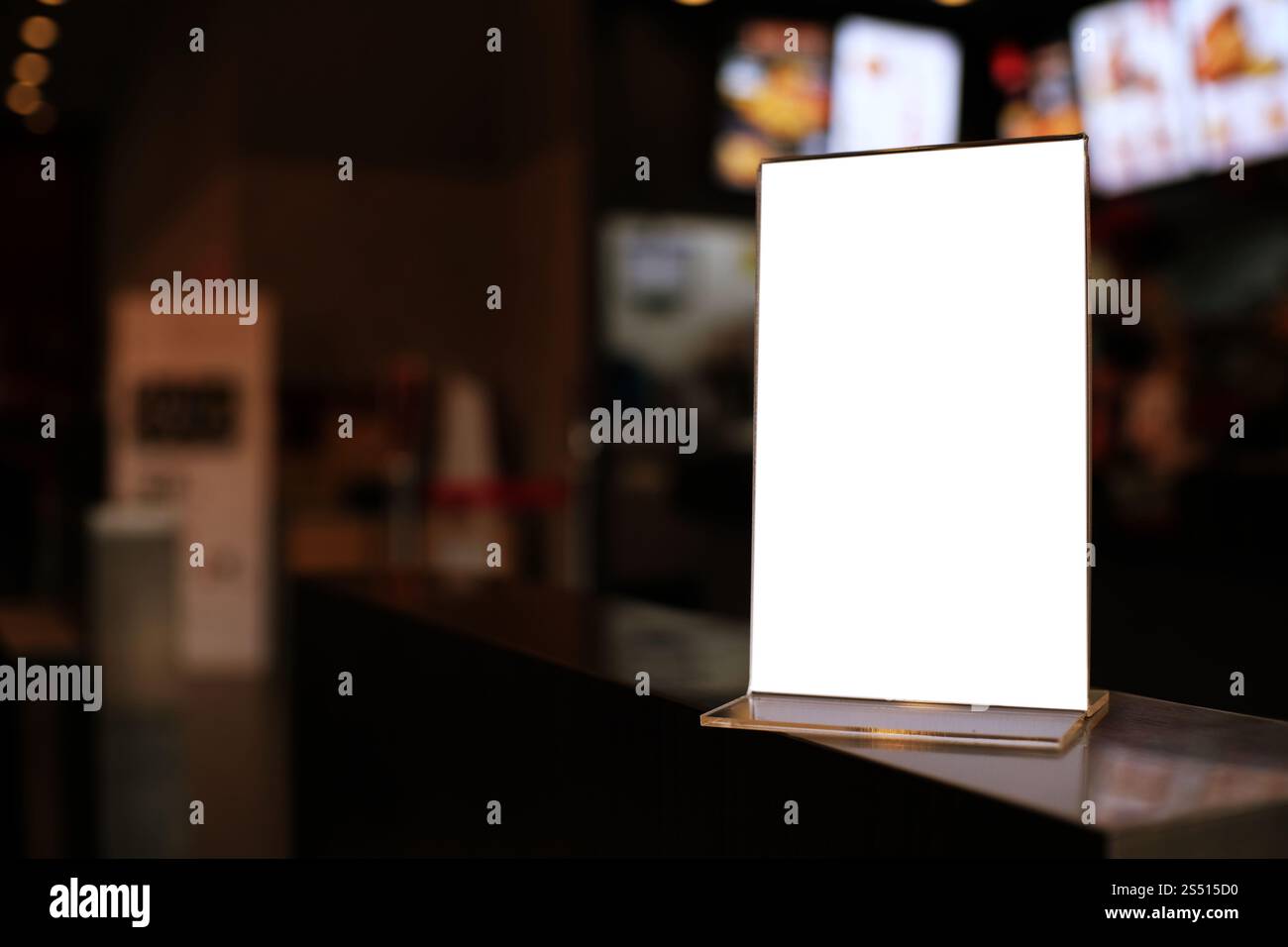 Mock up Menu frame standing on wood table in Bar restaurant cafe. space ...