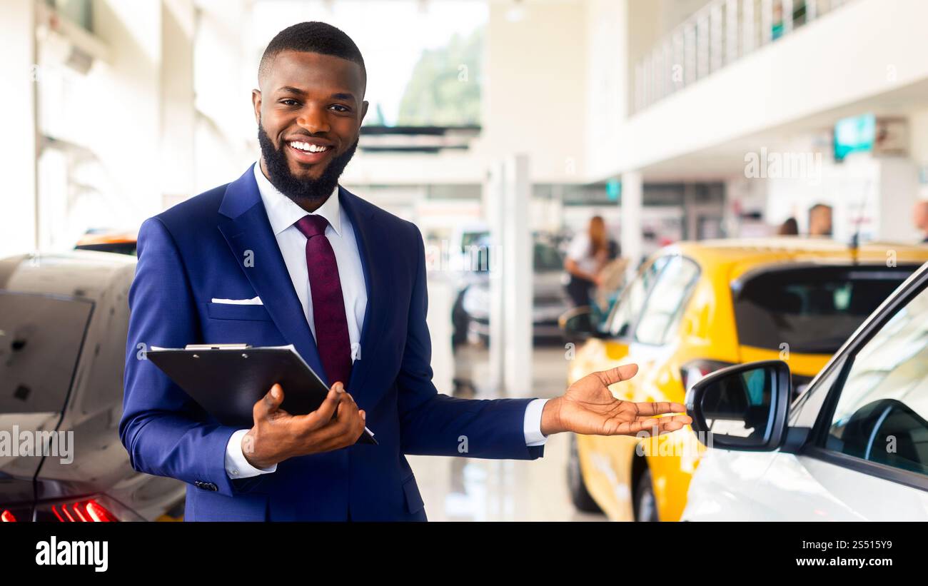 Portrait Of Handsome African American Salesman At Workplace In Car ...