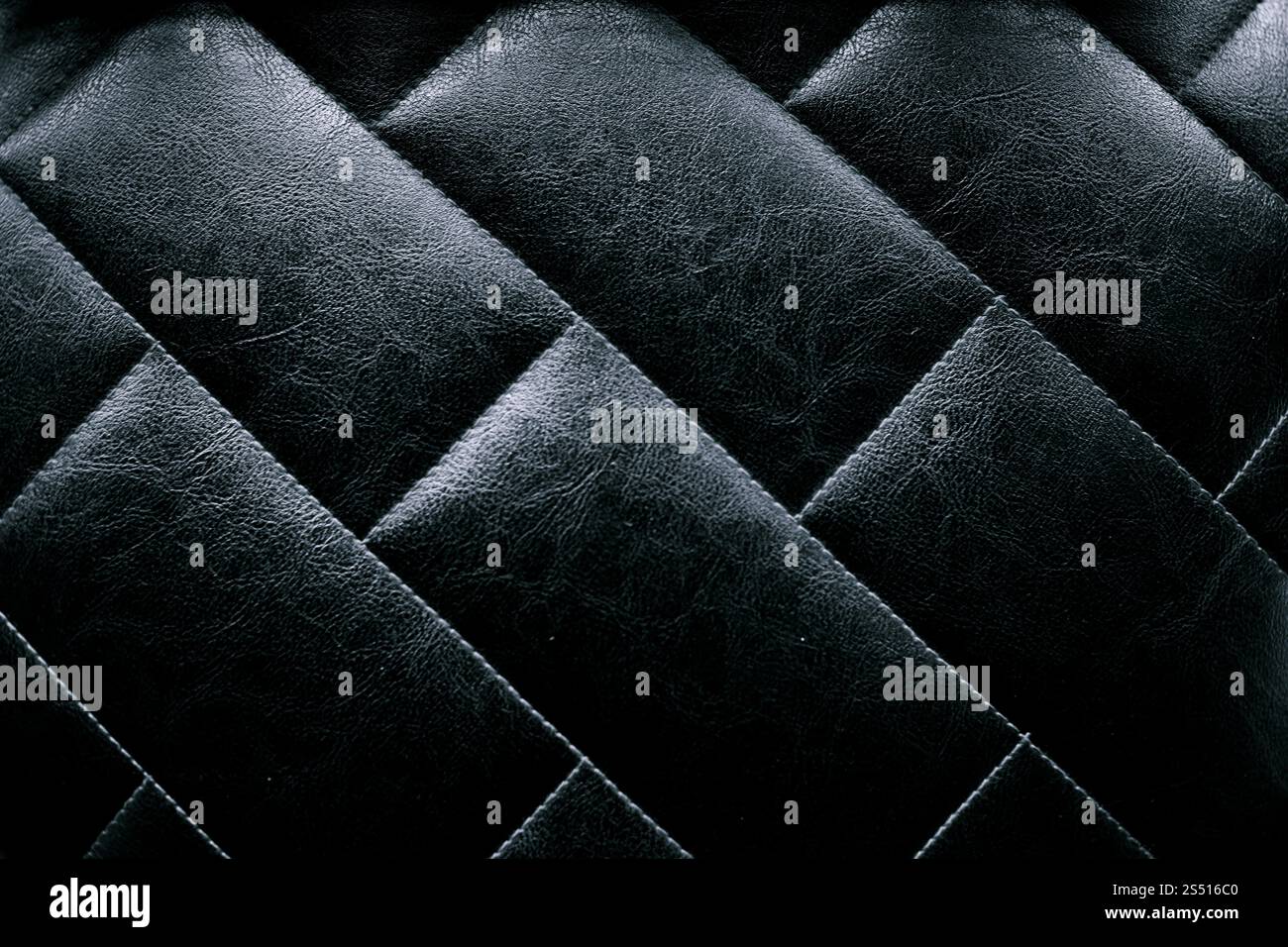 Black leather sofa texture background Stock Photo - Alamy