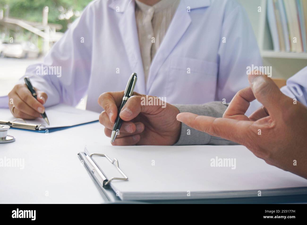 Professional medical doctor in white uniform gown coat interview ...