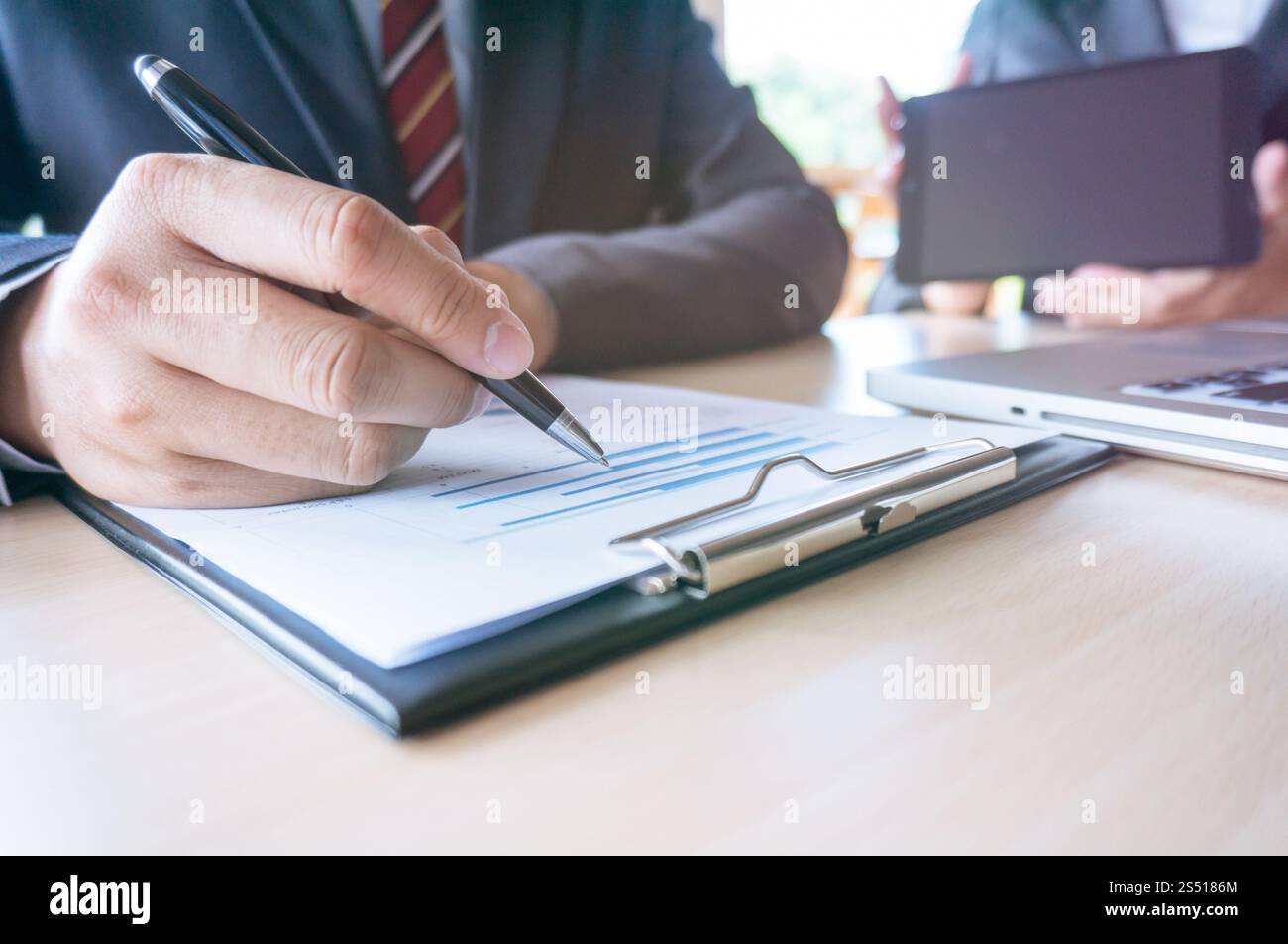 Man Completing Application Form during job interview. human resources ...