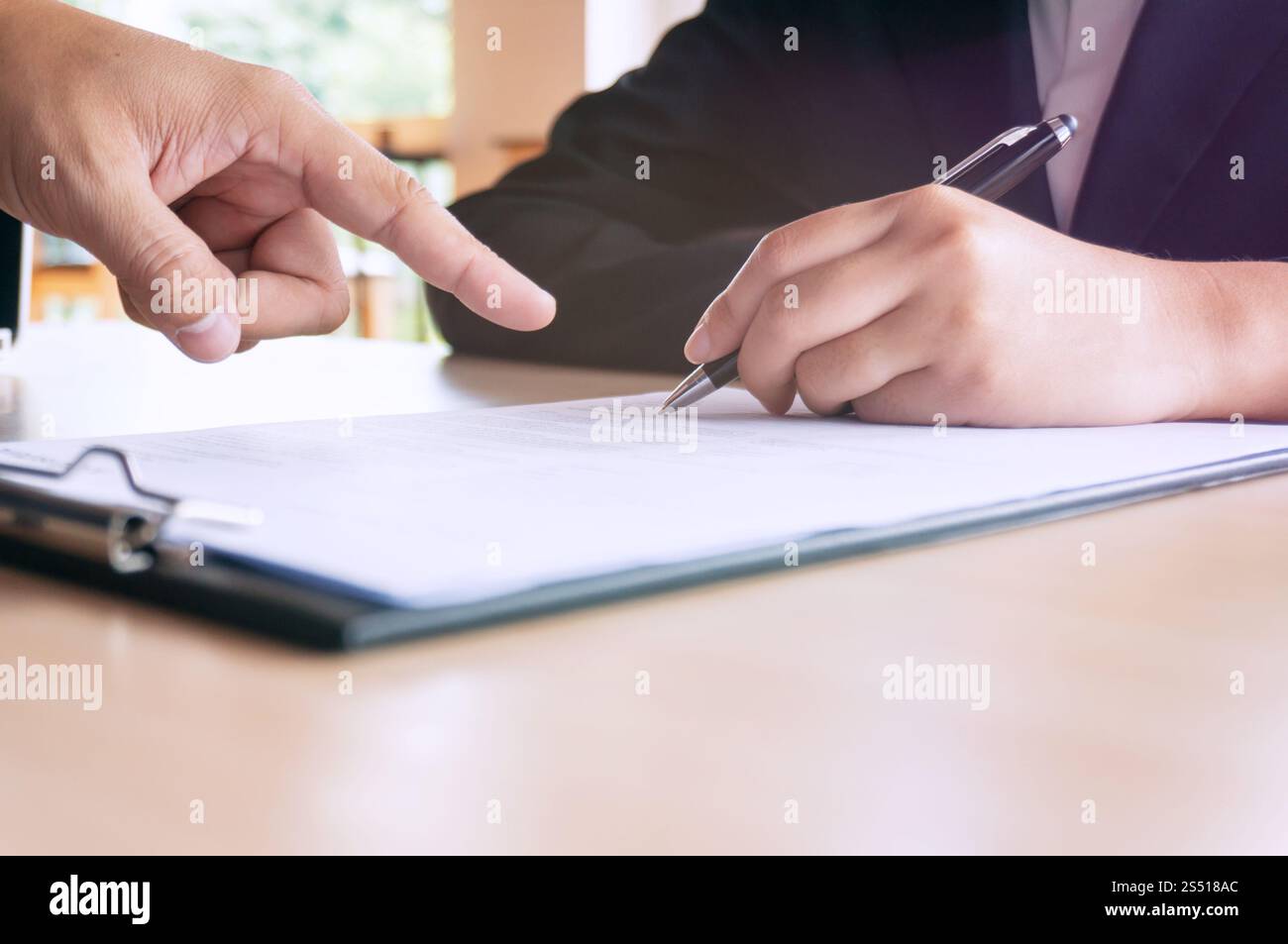Man Completing Application Form during job interview. human resources ...