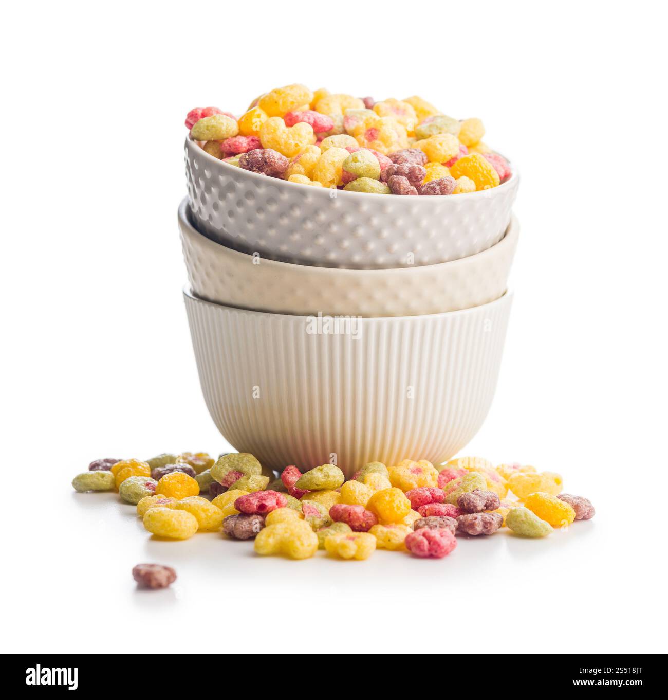 Colorful breakfast cereals in the shape of various fruit in bowl ...