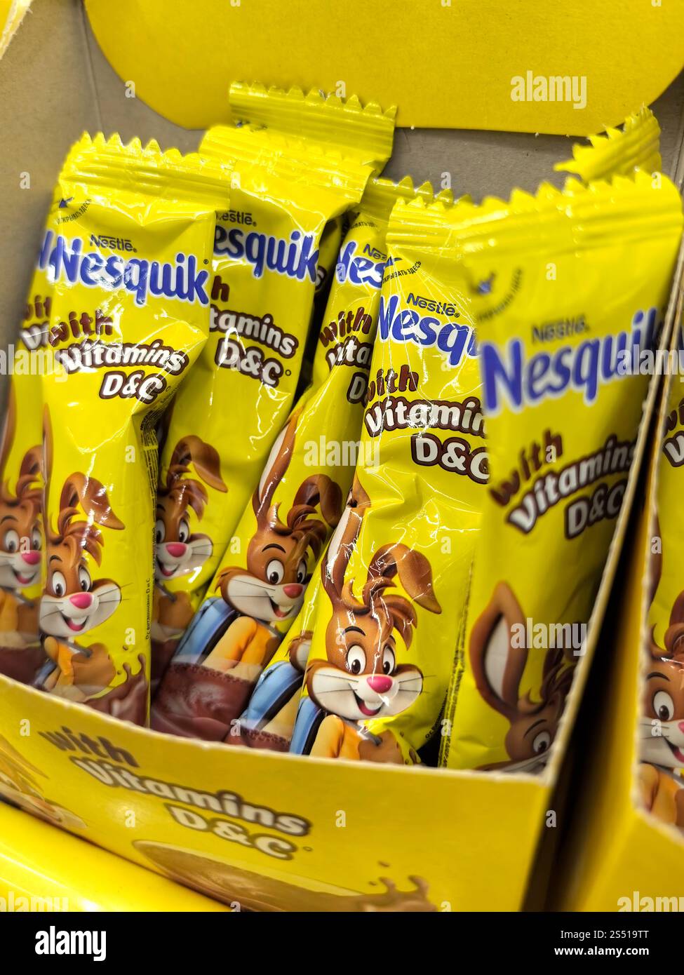 Bobruisk, Belarus - January 4, 2025: Bright yellow packages of a ...