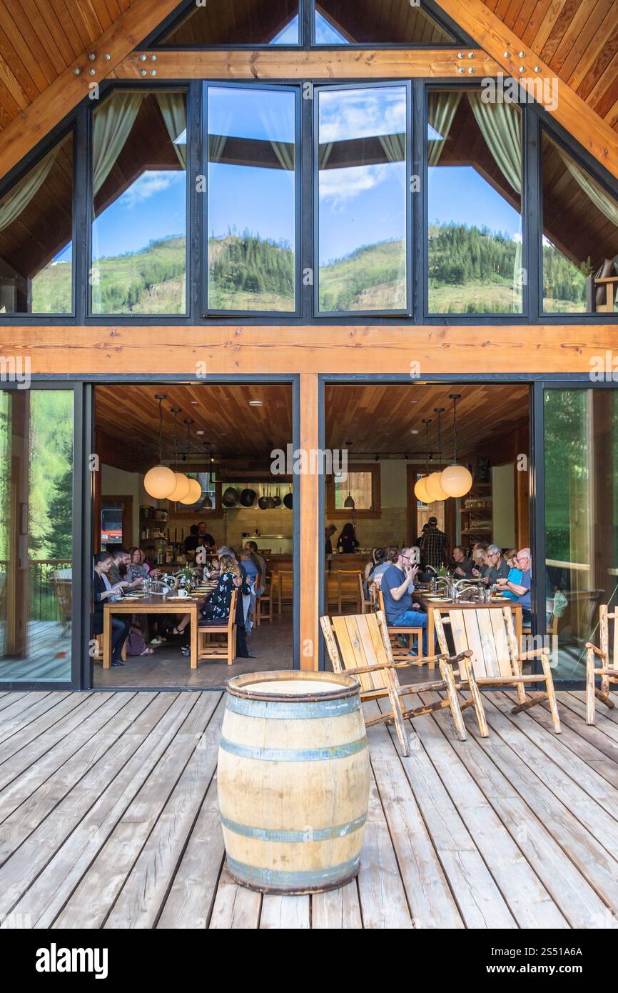 Rustic Lodge Interior With Wooden Furniture and Scenic Window View ...