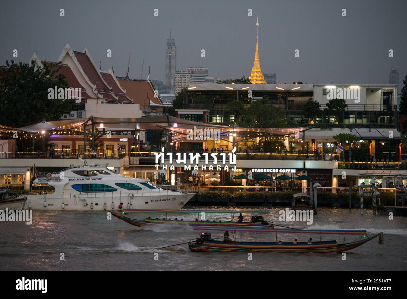 the Tha Maharaj at the chao phraya river in the city of Bangkok in ...