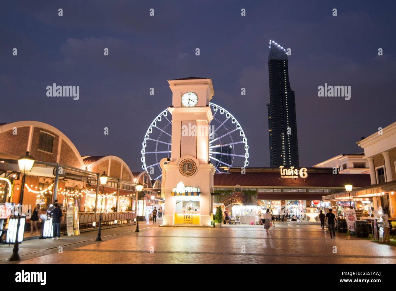 the clock tower and the Ferris Wheel of the Asiatique Riverfront ...