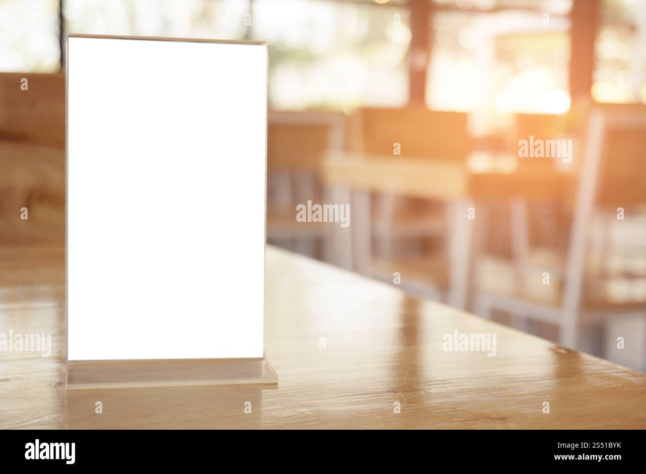Mock up Menu frame standing on wood table in Bar restaurant cafe. space ...