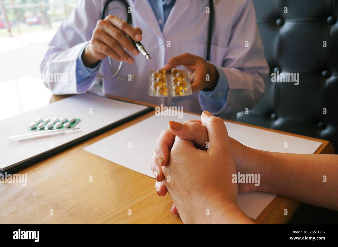 Health care Doctor giving medicine to patient for arthritis pain Stock ...