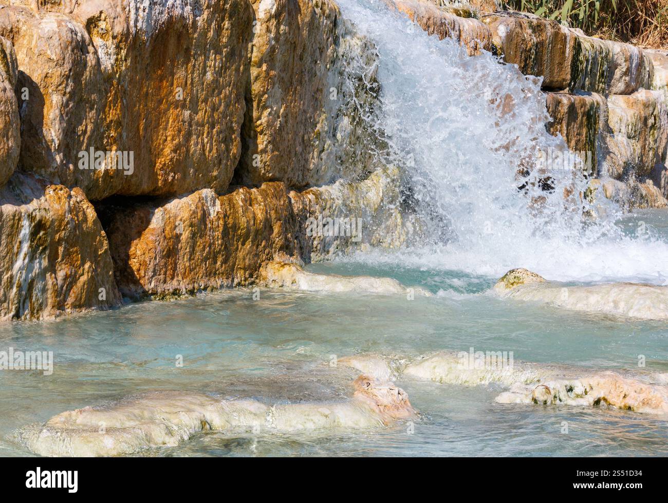 Natural spa with waterfalls and hot springs at Saturnia thermal baths ...