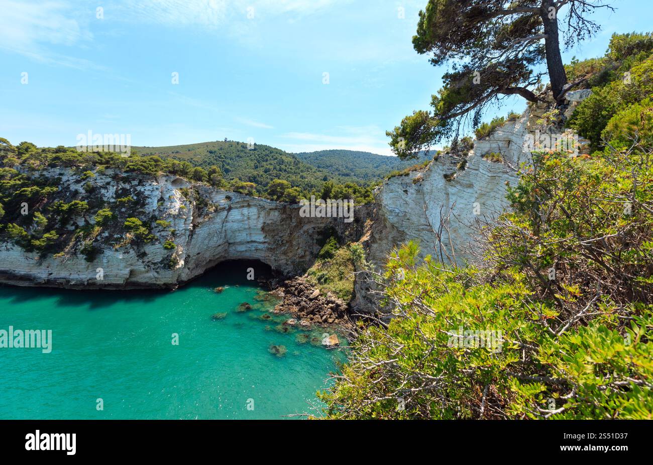 Summer sea coast near Architello (Arch) of San Felice on the Gargano ...
