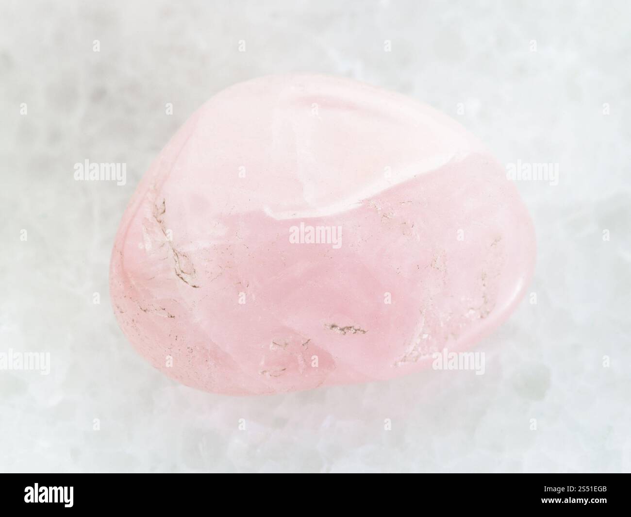macro shooting of natural mineral rock specimen - tumbled Rose Quartz ...