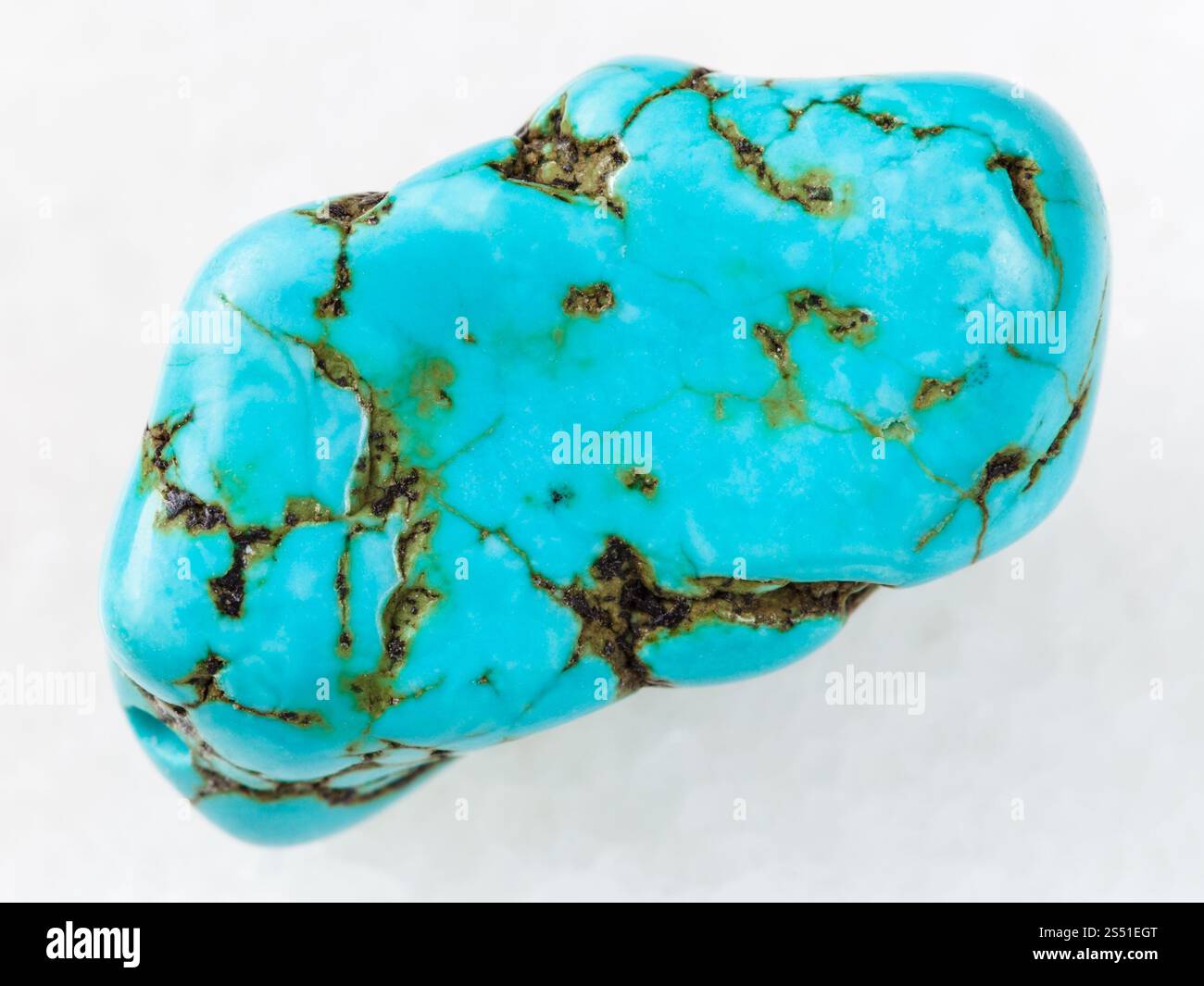 macro shooting of natural mineral rock specimen - tumbled blue howlite ...