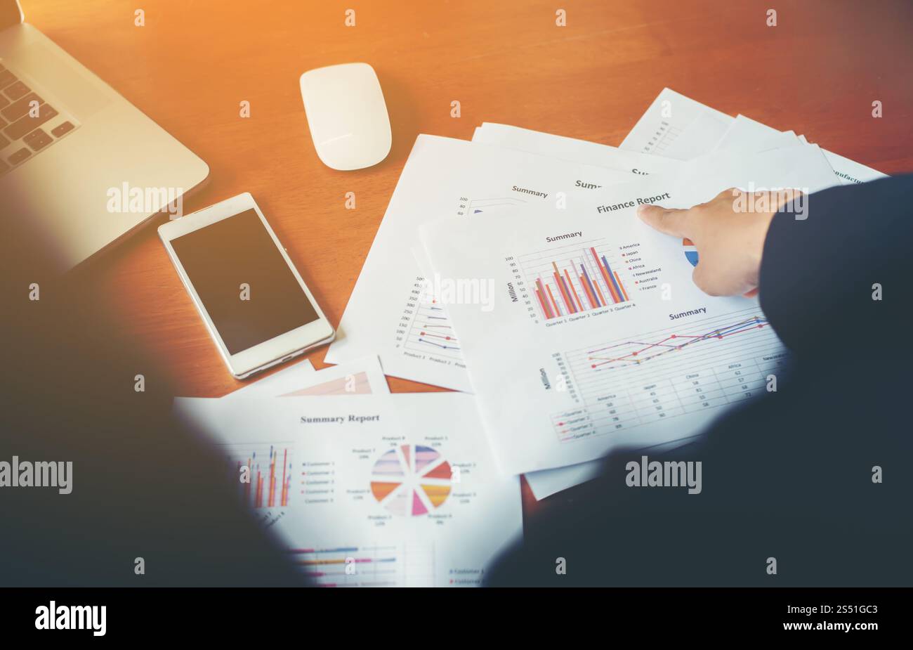 Team Business professionals working together at office wooden desk ...