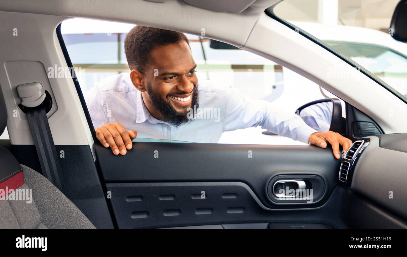Smiling Black Man Choosing New Vehicle, Looking Inside Of Car With ...