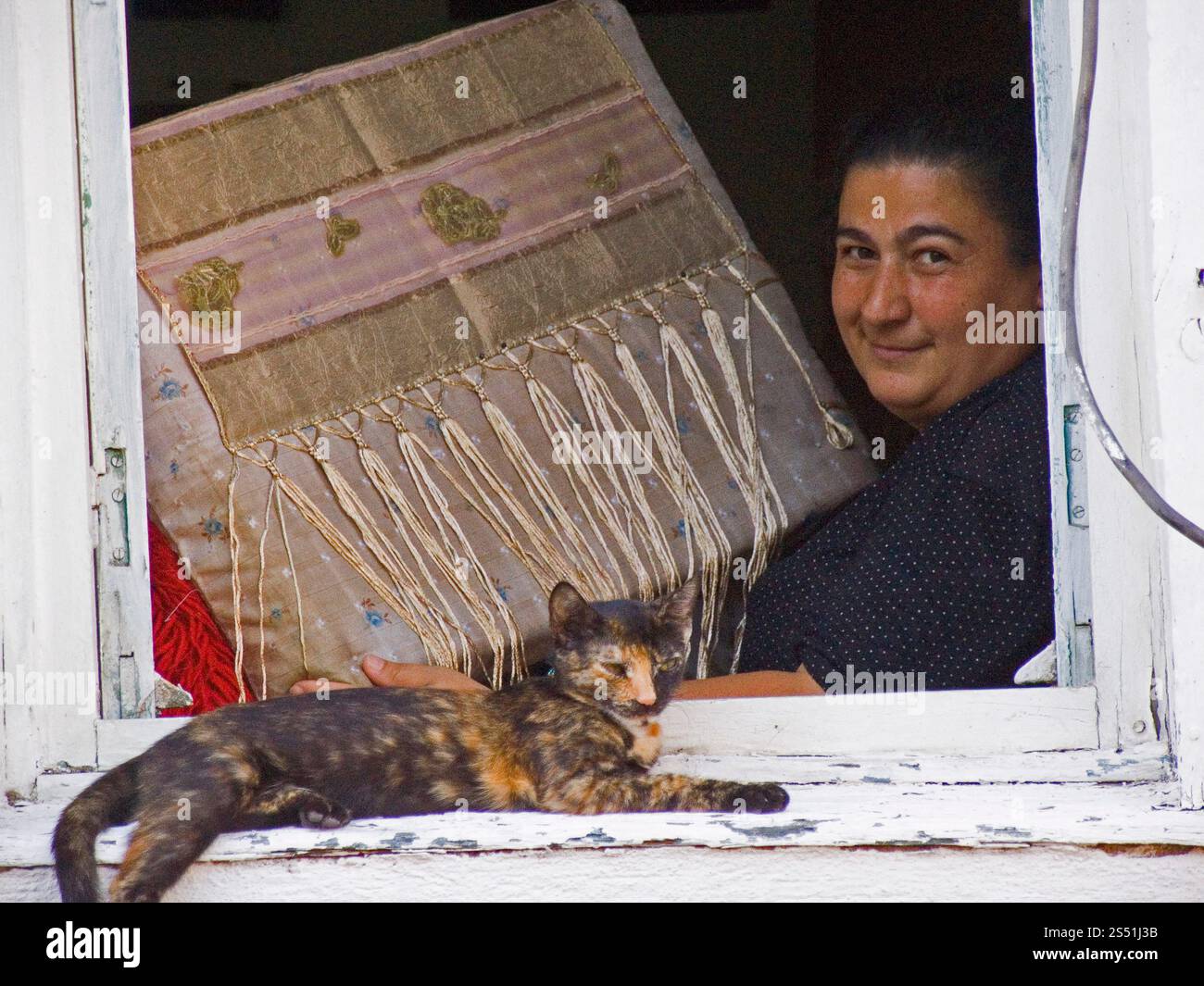 europe, greece, thrace, soufli village, daily life, woman shows her ...