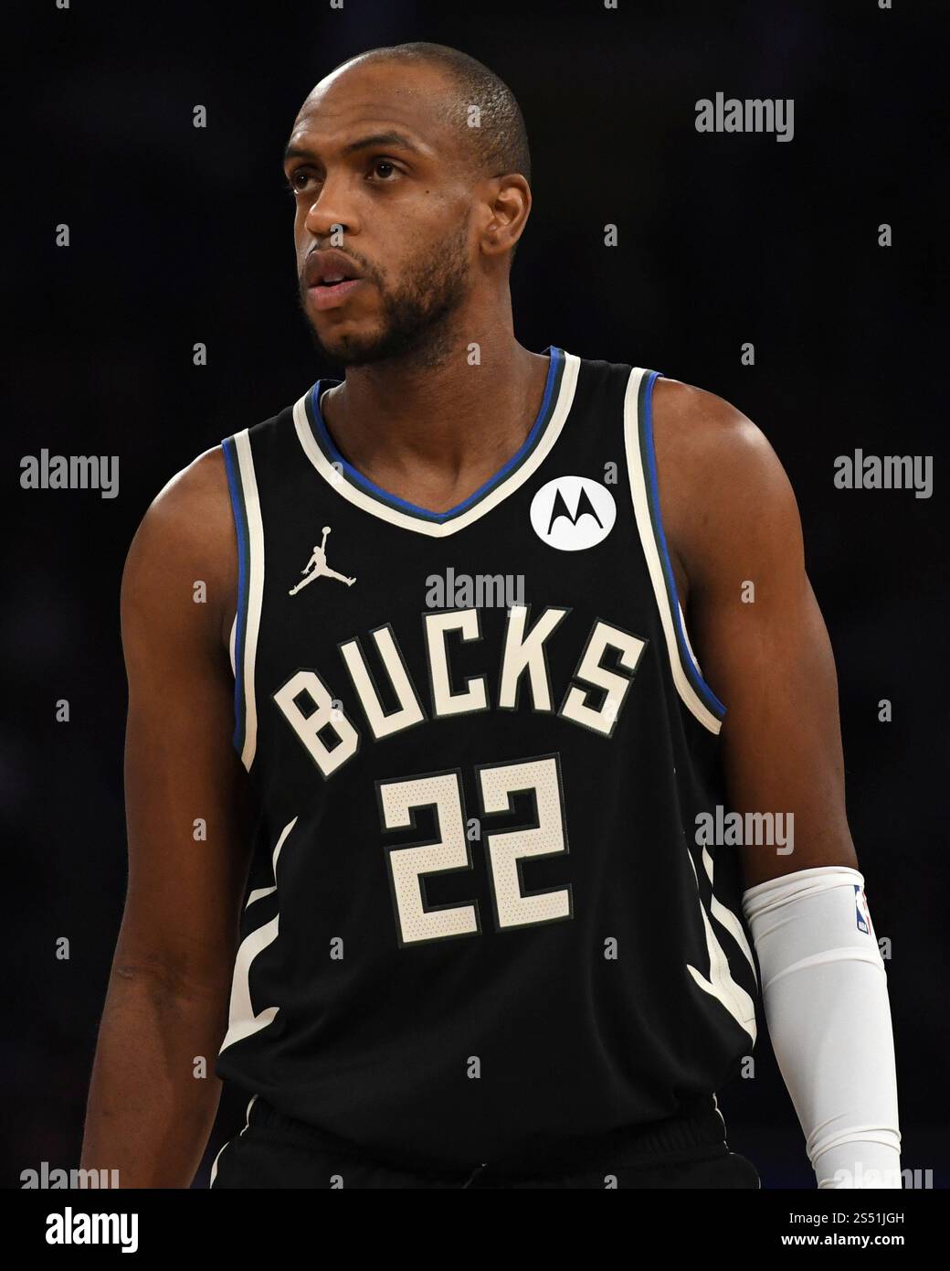 Milwaukee Bucks' Khris Middleton stands on the court during the first ...