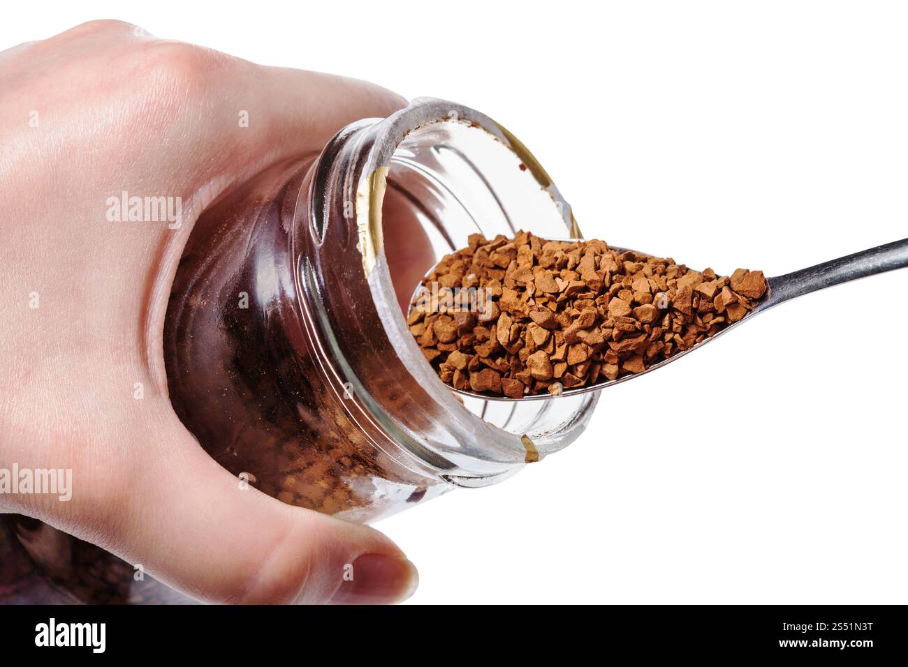 female hand keeps glass jar and spoon with instant coffee isolated on ...
