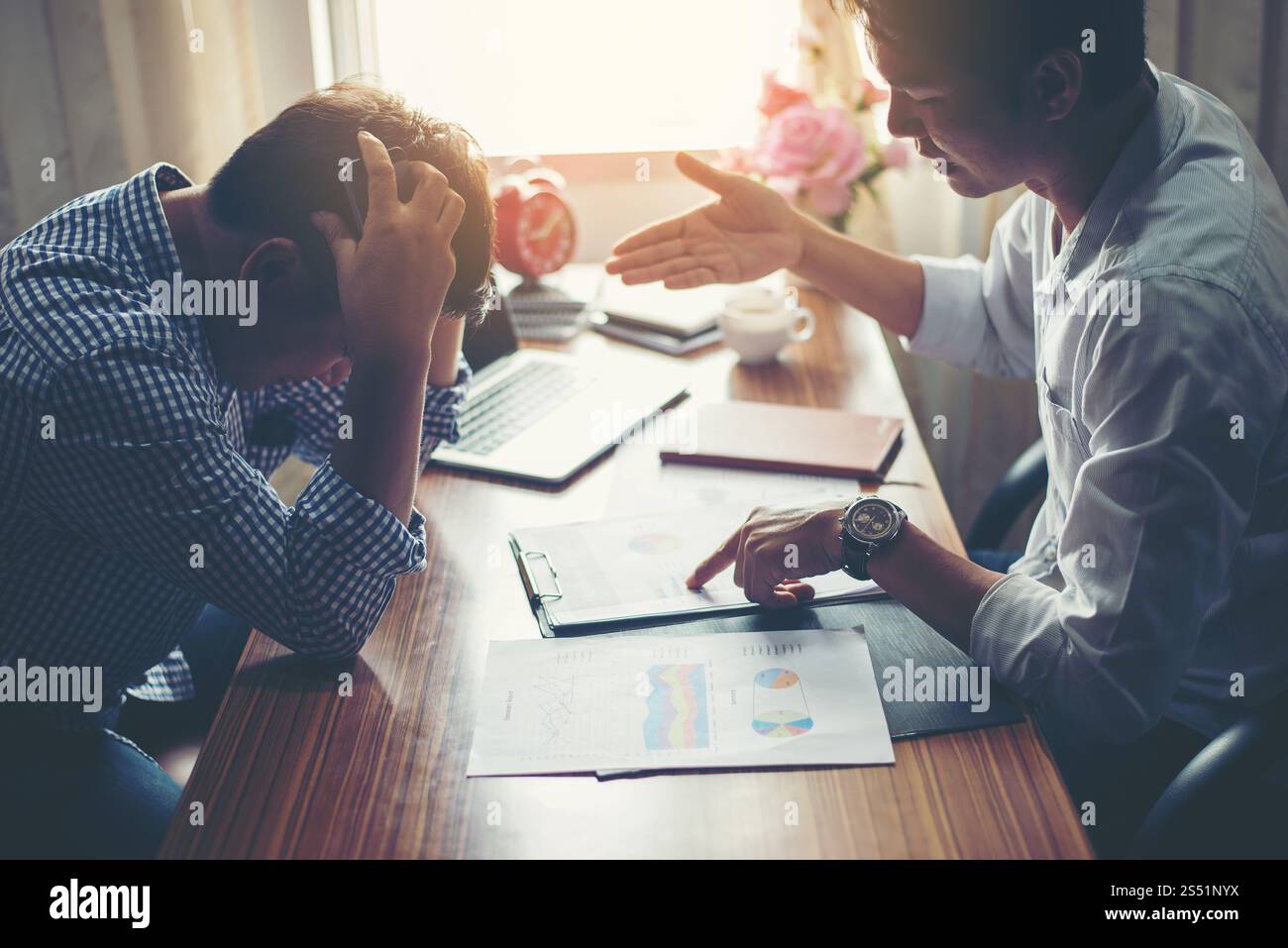 Serious male employees work hi-res stock photography and images - Alamy