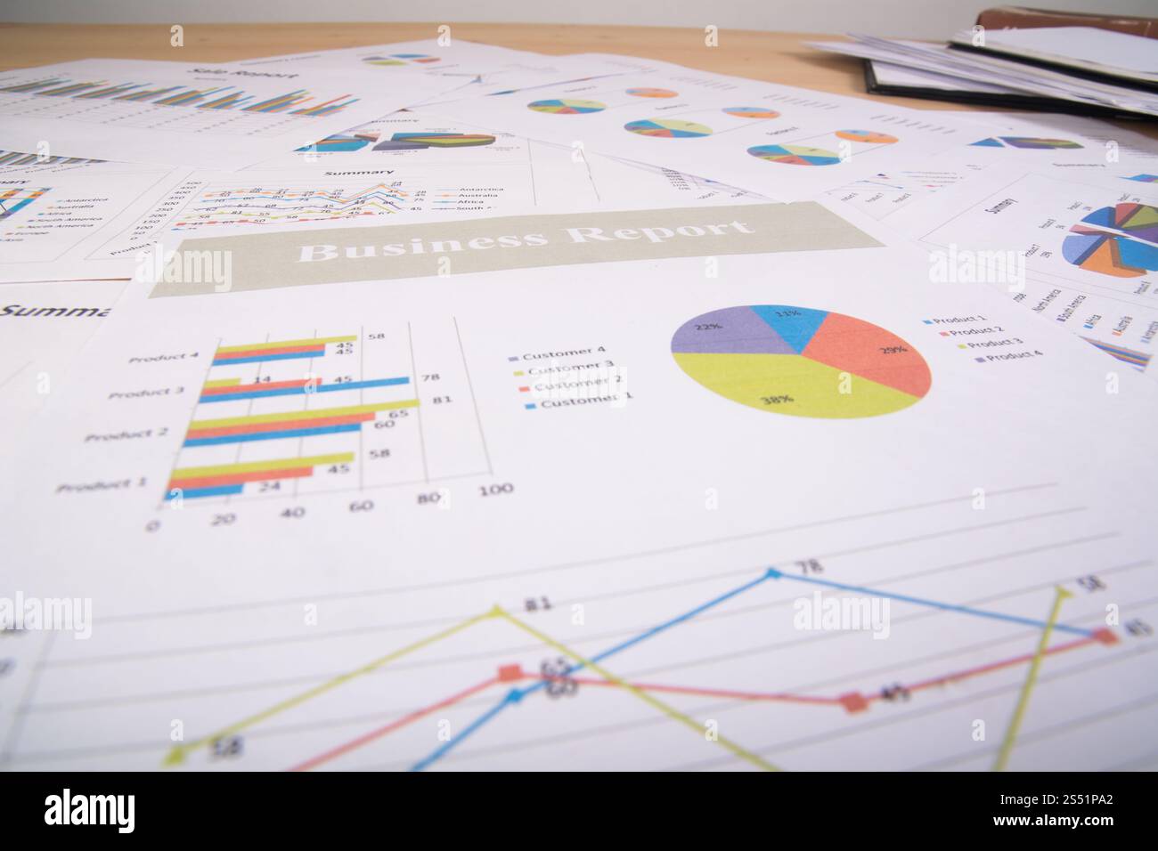Business report. Graphs and charts. Business reports and pile of ...
