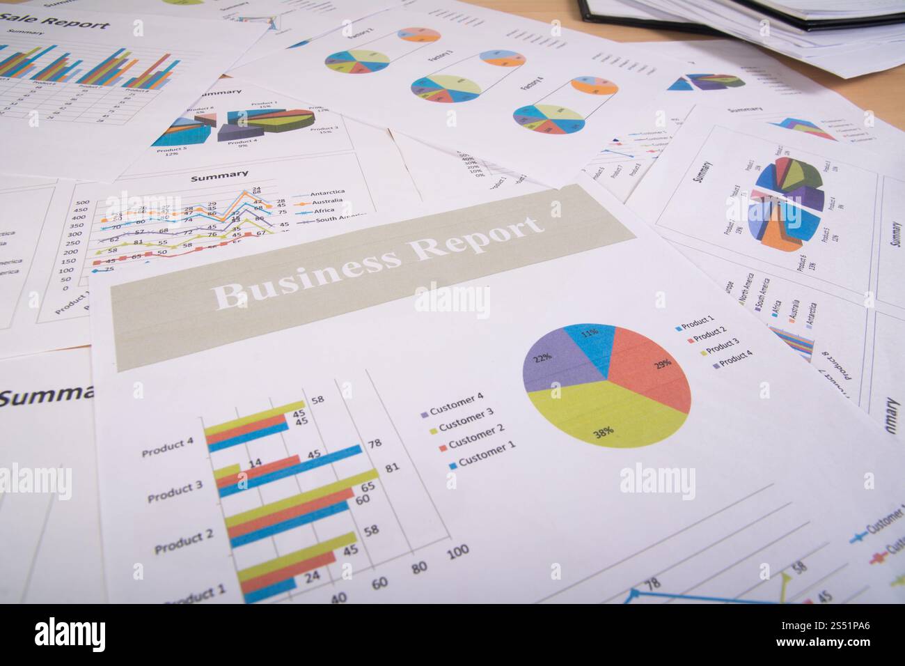 Business report. Graphs and charts. Business reports and pile of ...