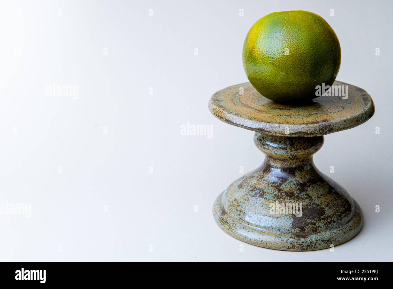 Navel Chocolate Oranges on the cake stand. White background. Chocolate ...