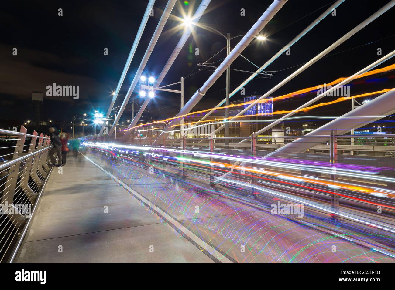 Pedestrian Bridge at Night with Traffic Lights and Motion Blur ...