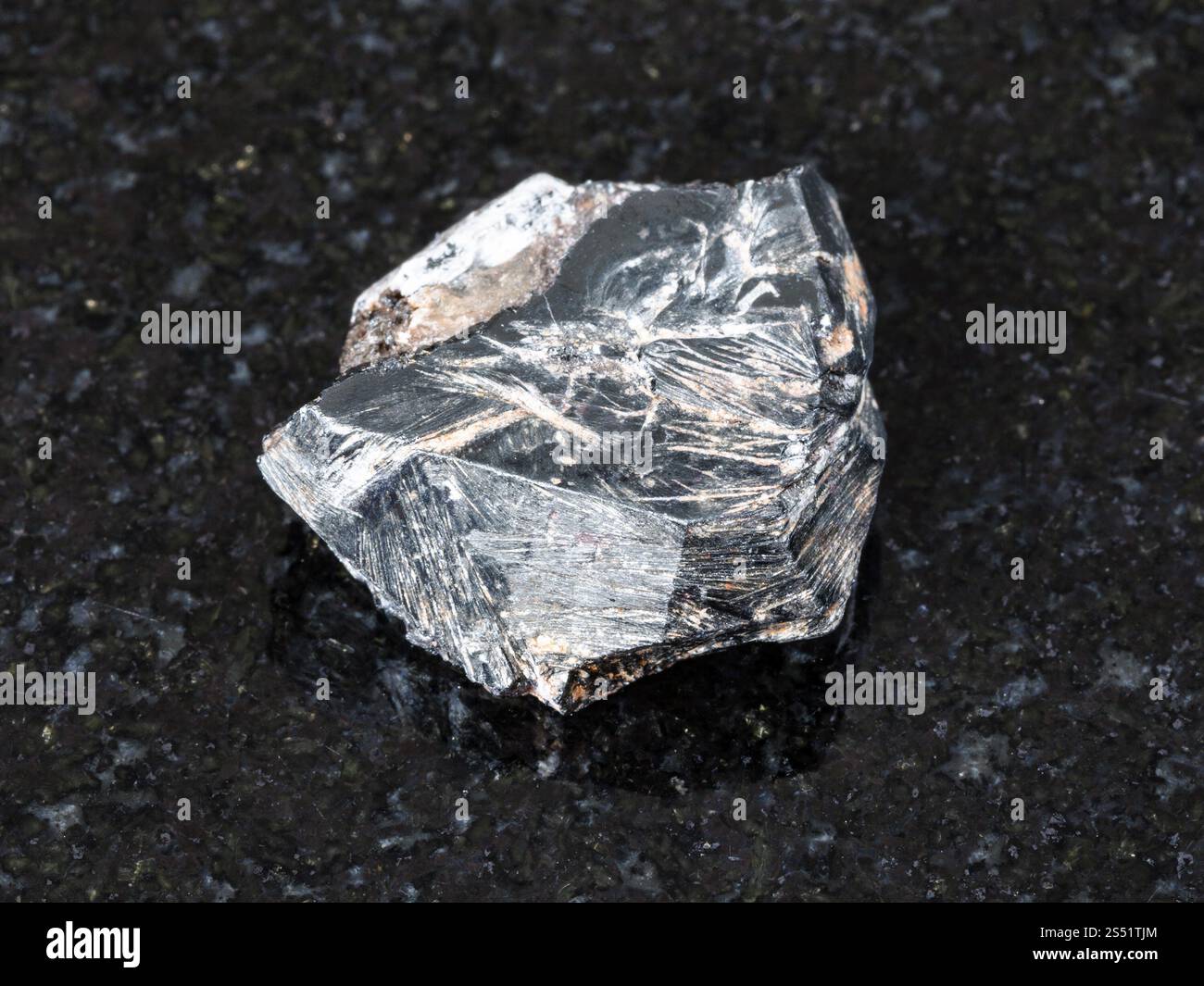 macro shooting of natural mineral - rough Hematite crystal on black ...